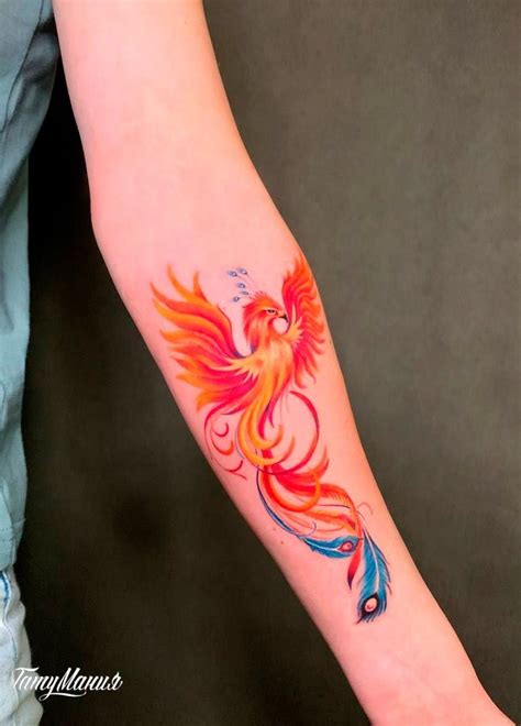 Тату на руке в виде феникса фото работ в каталоге тату салона в Москве