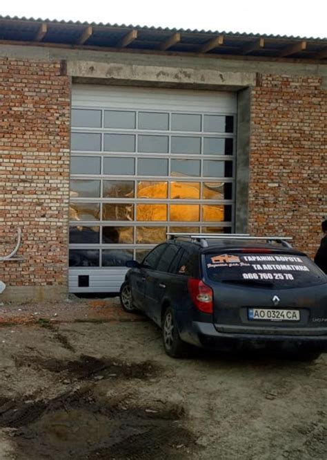 Панорамні промислові ворота ТМ «DoorHan» з вбудованою хвірткою ...