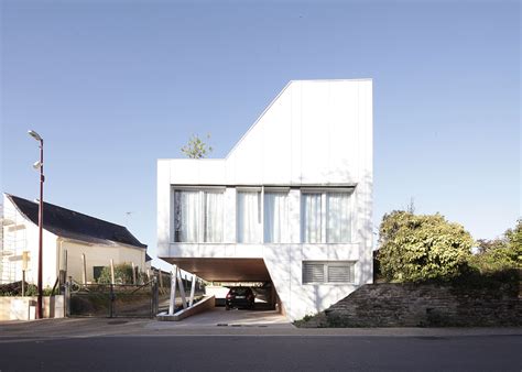 Retrofitted Shipping Containers Form Angular Flying Box House