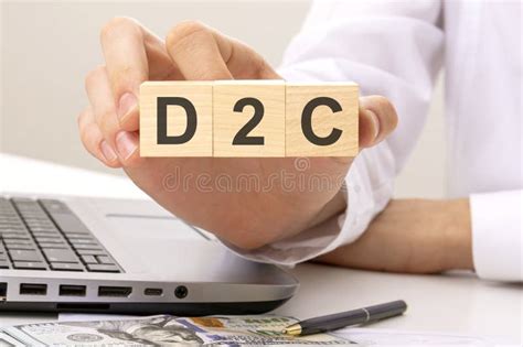 Hand Holds Wooden Cubes With Inscription D2c White Background Direct To Consumer Concept Stock