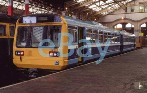 35mm Railway Slide Of Class 142 Dmu 142020 Manchester Vic Copyright