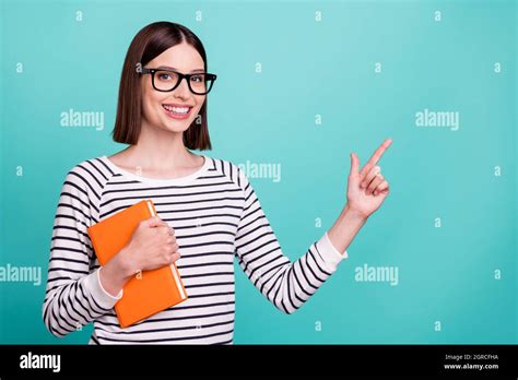 Photo Of Lady Hold Book Direct Finger Empty Space Promoting Tips Wear