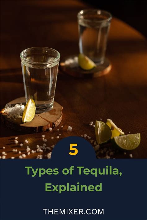 Three Glasses Filled With Water And Lemons On Top Of A Wooden Table Next To Some Salt