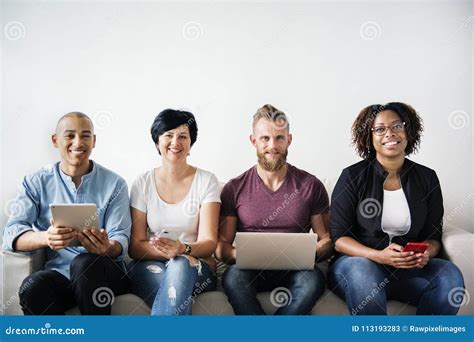 Group Of Diverse People Using Digital Devices Stock Image Image Of
