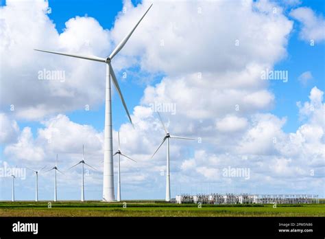 Wind Park With Tall Wind Turbines And An Electricity Substation Under
