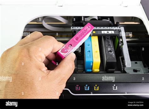 Technicians Are Install Setup The Ink Cartridge Of A Inkjet Printer The