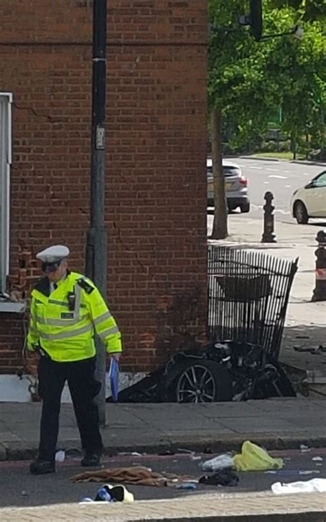 Man Killed And Three Injured As Car Crashes Through Railings Into