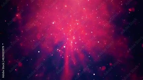 Particles exploding from the center, with bokeh lights simulating a nebula effect, gradually ...