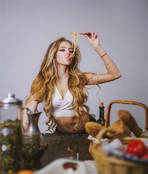 Premium Photo Sexy Kitchen Woman Eats Spaghetti Woman Italian Cuisine