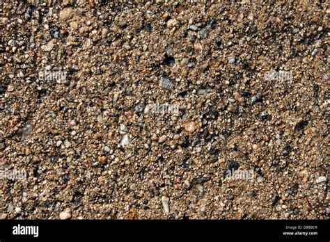 A Close Up View Of A Cement Sidewalk Highlighting The Texture Of The