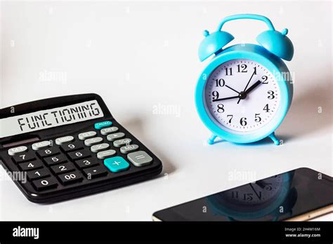 The Word Functioning On The Calculator Business And Finance Concept