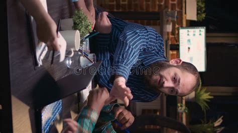 Vertical Video Company Team Group Brainstorming In Business Meeting