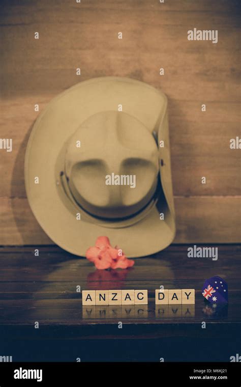 Anzac Army Slouch Hat With Australian Flag On Vintage Wood Background