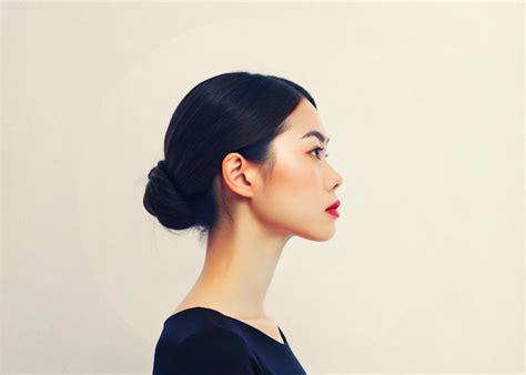 A Woman With A Red Lip And A Black Hairline Premium Ai Generated Image