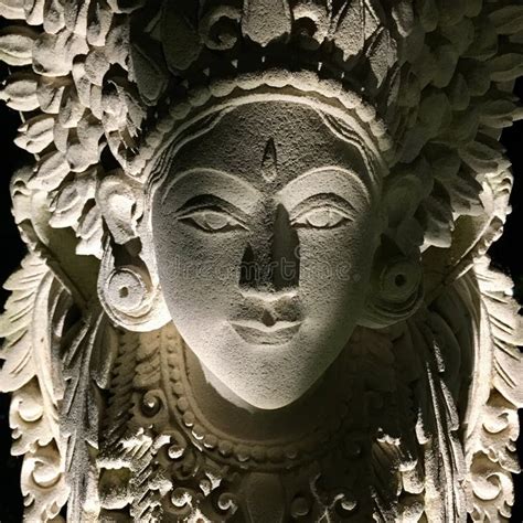 Monumental Sculpture Depicting Ancient Human Representation At
