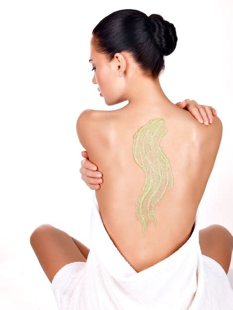 Free Photo Woman Cares About Skin Of Body Using Cosmetic Scrub On The