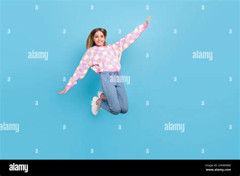 Full Length Body Size View Of Attractive Funny Girly Cheerful Girl Jumping Having Fun Isolated