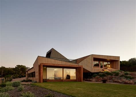 Split House By Bkk Architects Is Made Up Of Angular Wooden Structures