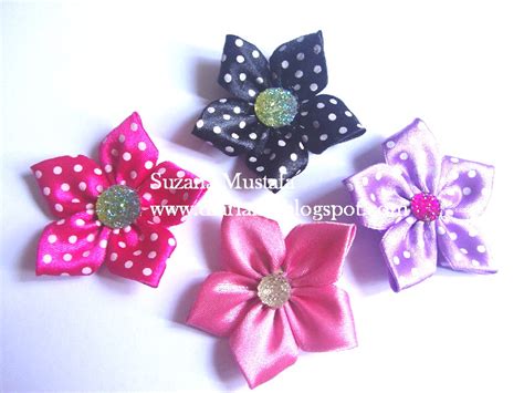 Suzana Mustafa Pin Bunga Reben