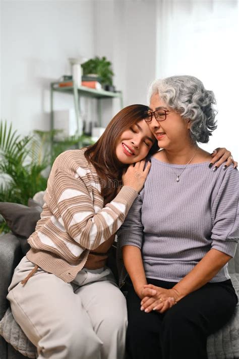 Smiling Asian Woman Embracing Mature Mother Expressing Unconditional Love Stock Photo Image Of