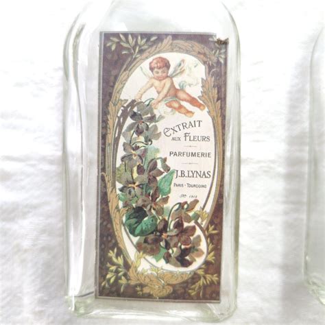 lot de deux fioles en verre savon et parfum Label Emmaüs