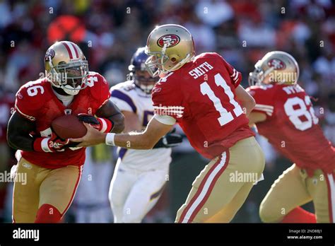 San Francisco 49ers Quarterback Alex Smith 11 Hands Off To San