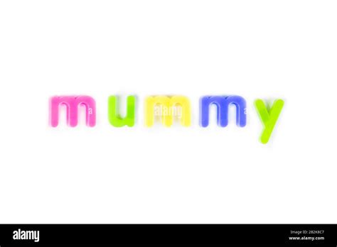 Colorful Alphabet Magnets Spell Mummy Over White Background Stock