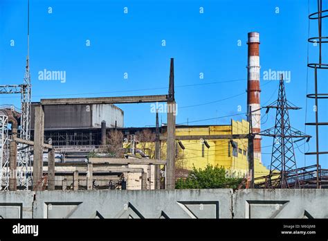 Industrial Power Grid And Plant Infrastructure With Transmission Towers