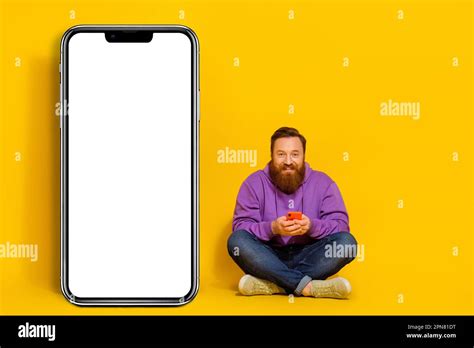 Full Length Portrait Of Nice Person Sit Floor Hold Telephone Empty
