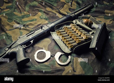 Set Of Weapons Of A Fighter Of A Special Unit Shotgun Ammo Grenade And Handcuff Top View