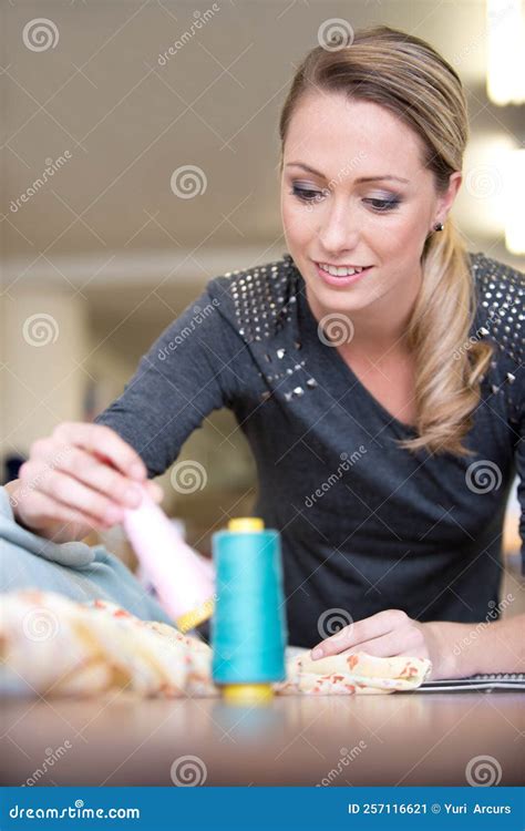 Being Creative With Textures And Colors An Attractive Young Seamstress