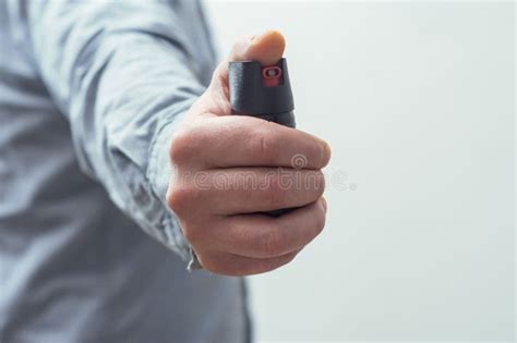 Close Up Of Hand Holding Pepper Spray Self Defense And Security