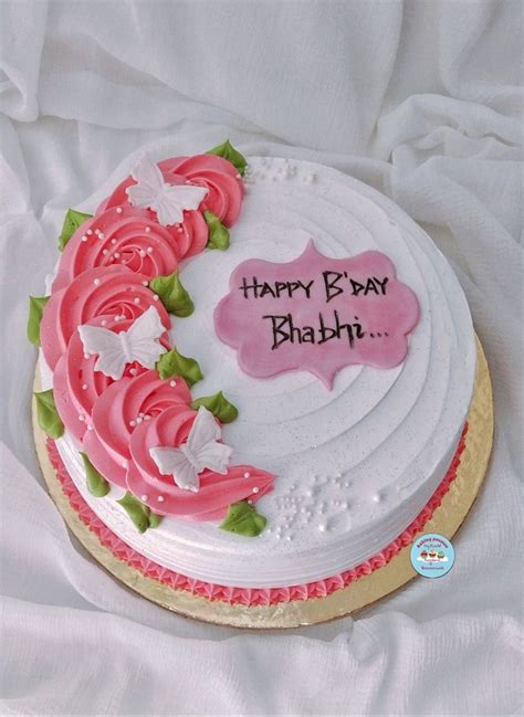 Rosettes Cake With Pink Flowers And Leaves Decoration