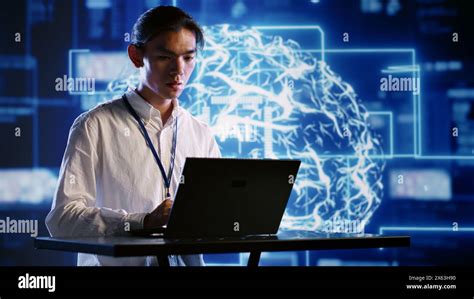 Admin Using Laptop To Visualize Artificial Intelligence Neural Networks Made Up Of