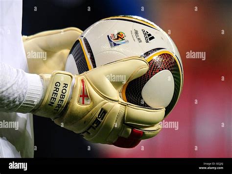 The Adidas Jabulani World Cup match ball in the hands of England ...