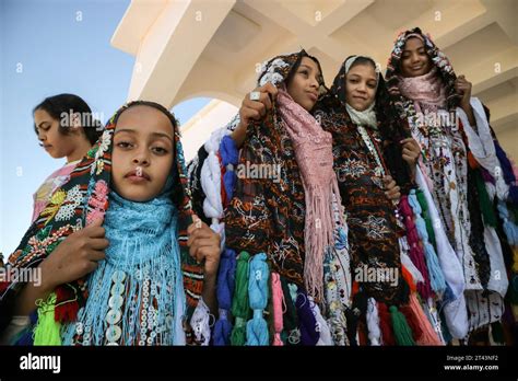 Young Girls Stand Wearing The Traditional Womens Costumes Of Siwa