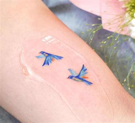 Flying Bird Tattoo On Wrist
