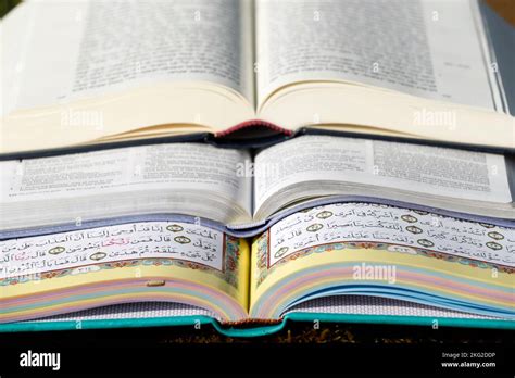 Open Religious Books Quran Bible And Torah Christianity Islam