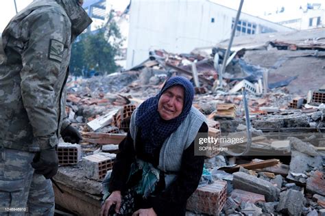 A Woman Mourns The Death Of Her Husband And Grandson Who Died In The