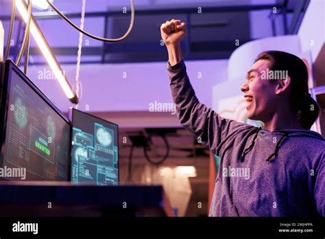 Happy Hacker Making Victory Gesture After Getting Server Access Granted