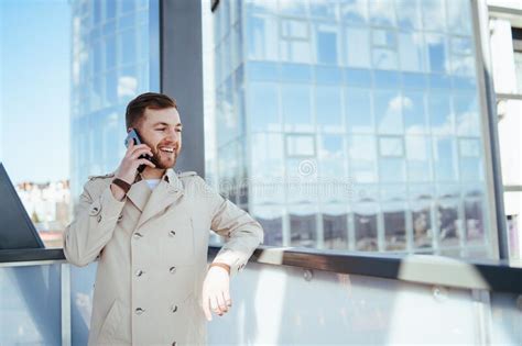 Man Walks Down The Street And Talks On Phone Stock Image Image Of