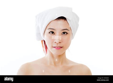 Asian American woman with towel wrapped on head Stock Photo - Alamy