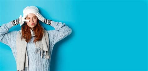 Free Photo Winter And Holidays Concept Happy Redhead Girl In Beanie