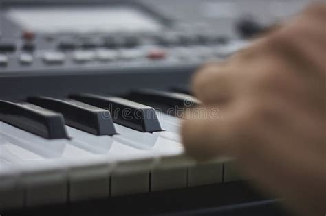 Musician Playing Keyboard Synthesizer Creating Music With Electronic Instrument Stock Image