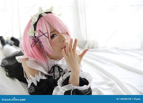 Portrait Of Japan Anime Cosplay Woman White Japanese Maid In White