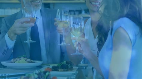 Three People Clinking Glasses At Restaurant Video From Pikwizard