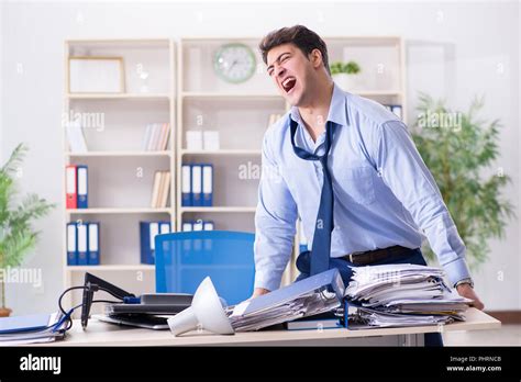 Angry Businessman Frustrated With Too Much Work Stock Photo Alamy