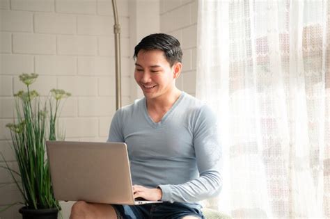 Premium Photo Lgbt Young Men Use Computers To Communicate With Their