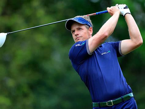 Download Briny Baird Perfecting His Swing On The Golf Course Wallpaper