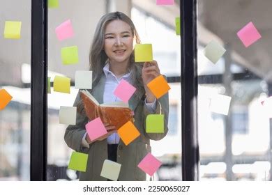 Business Female Employee Many Conflicting Priorities Stock Photo 2250018045 Shutterstock